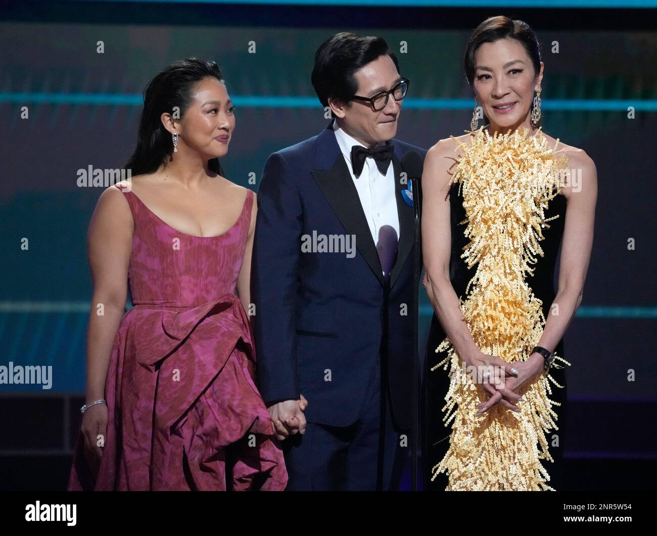 Stephanie Hsu, from left, Ke Huy Quan, and Michelle Yeo, members of the cast of "Everything ...