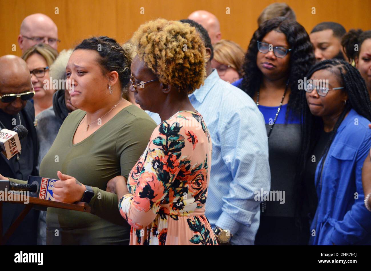 Christianna May Kelly, left, is comforted by her aunt Shonda May as she ...