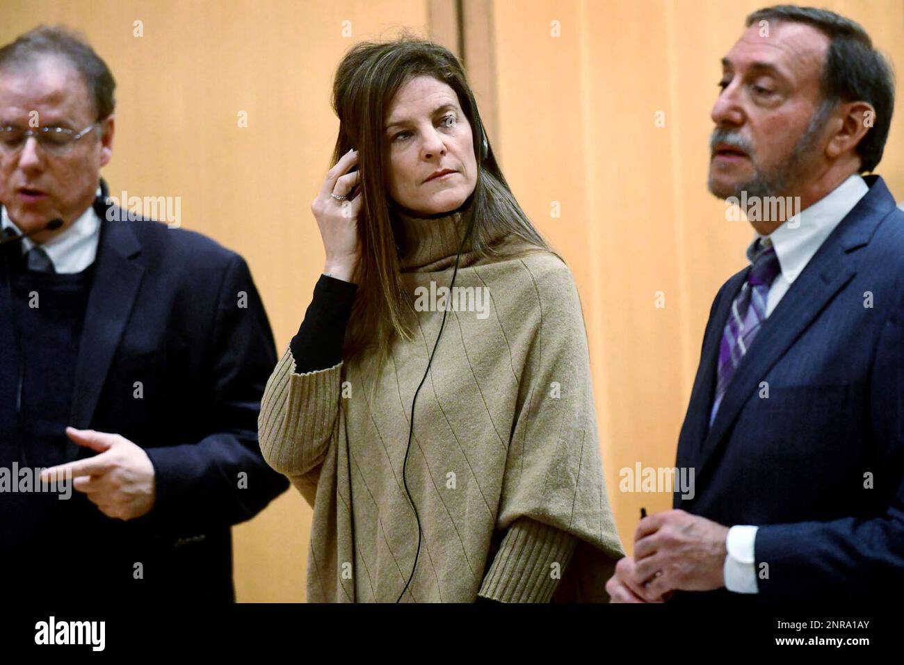 Michelle Troconis appears for a pre-trial hearing with an interpreter ...