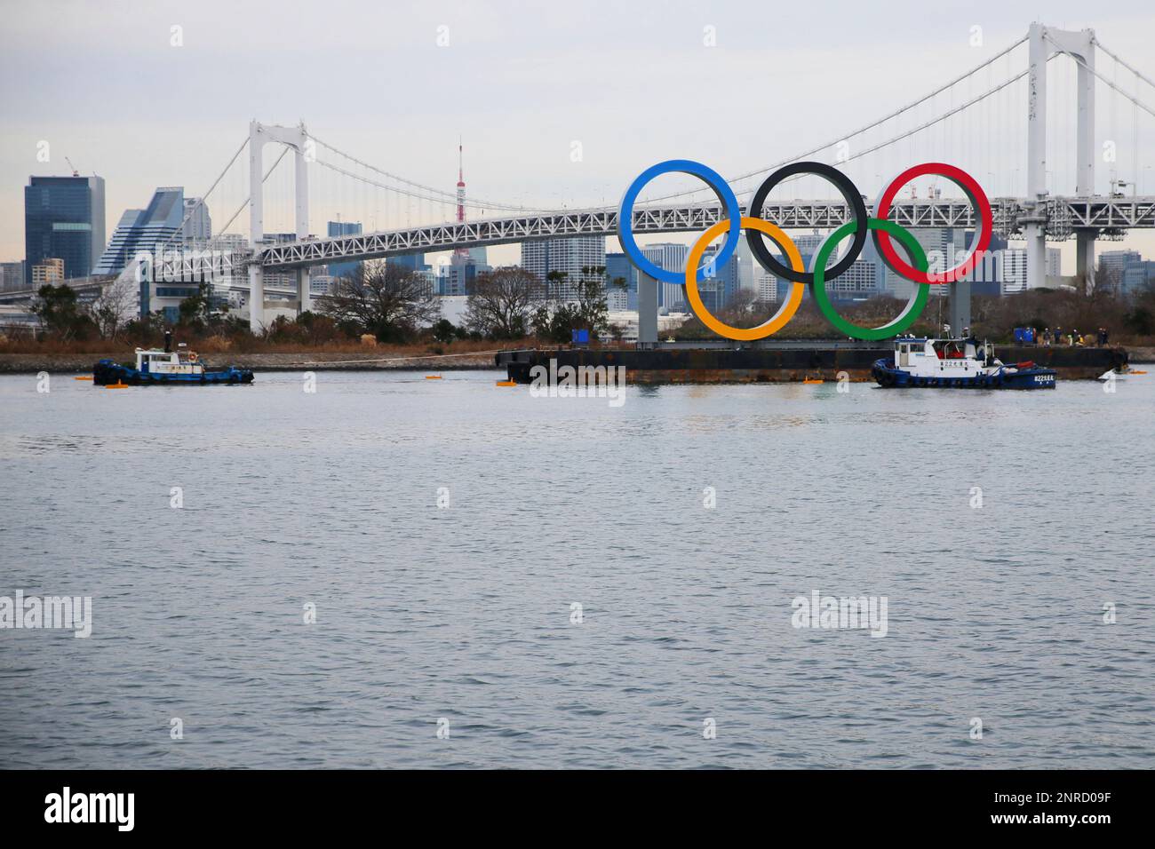 A monument of five-ring emblem is set up on the water to enhance ...