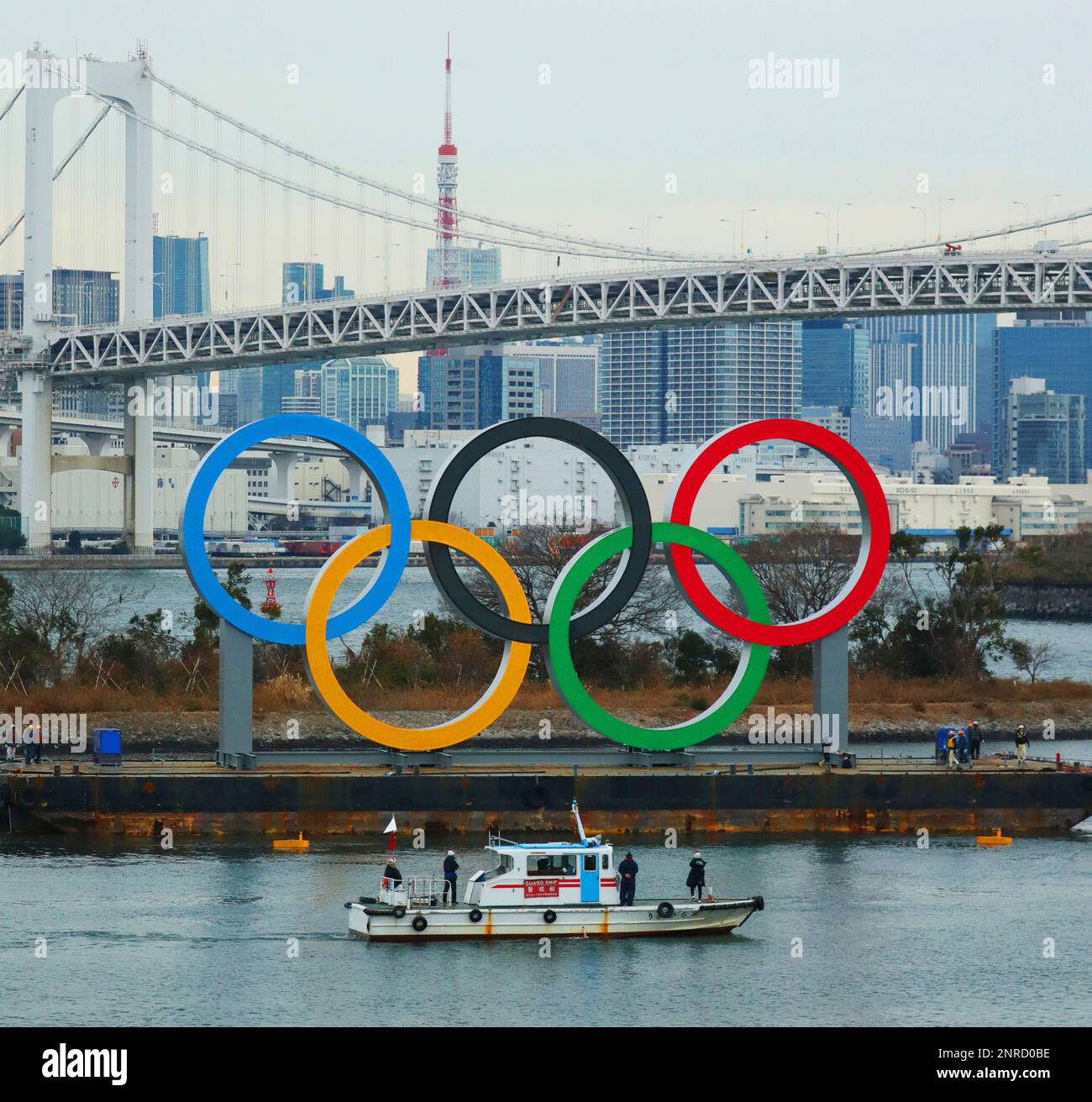 A monument of five-ring emblem is set up on the water to enhance ...
