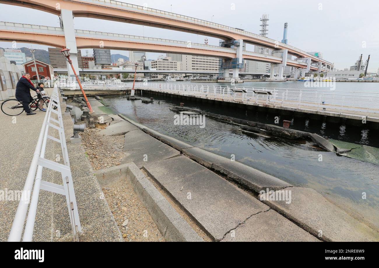 A picture shows a damaged quay wall at Port of Kobe Earthquake Memorial ...