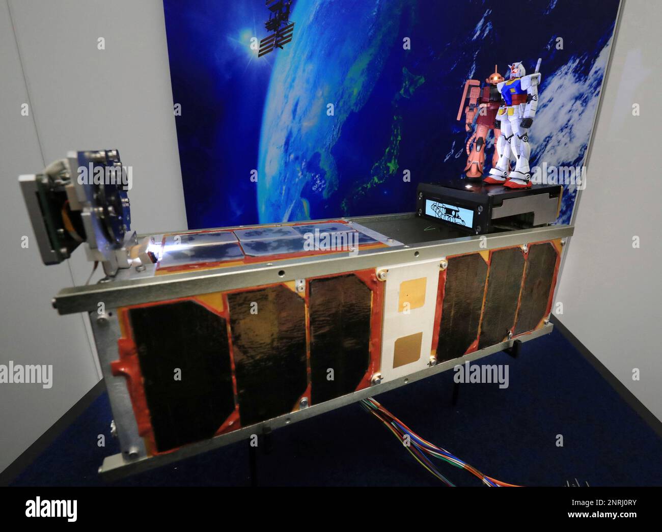 A replica of G=SATELLITE, a ultra small satellite with plastic models ...