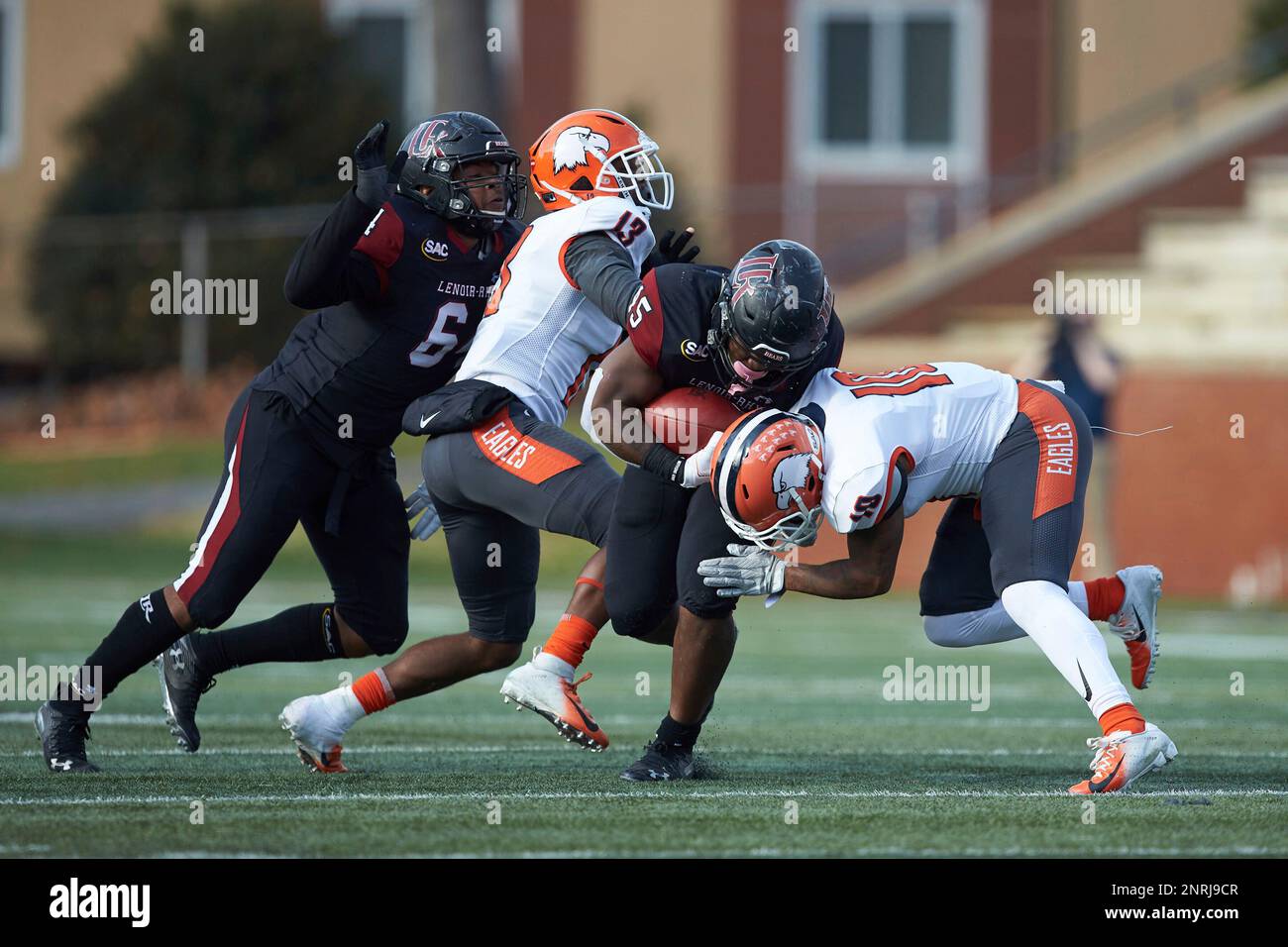Lenoir Rhyne Bears running back Ameen Stevens (45) bounces off a hit by ...