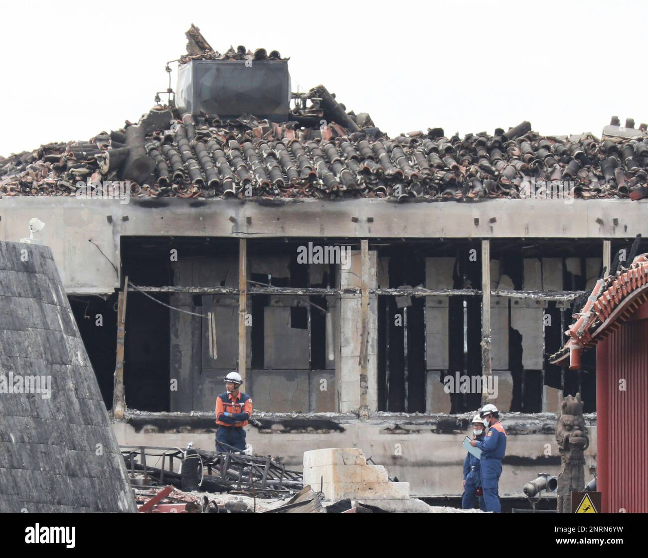 Firefighters make an inspection at the fire site of Shuri Castle in ...