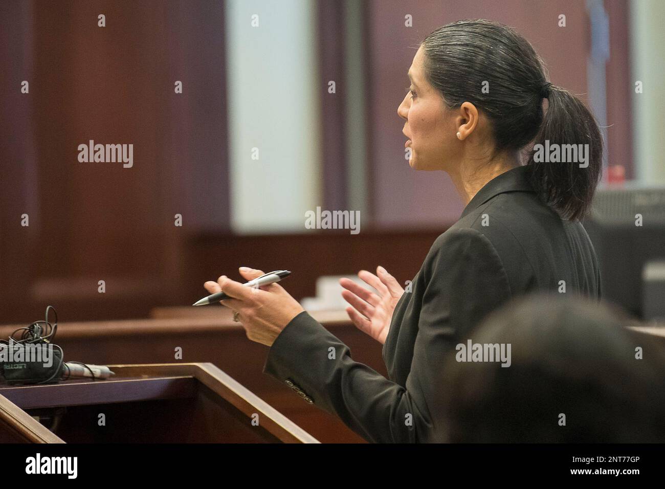 DeKalb County Assistant District Attorney Mirna Andrews (right) cross ...