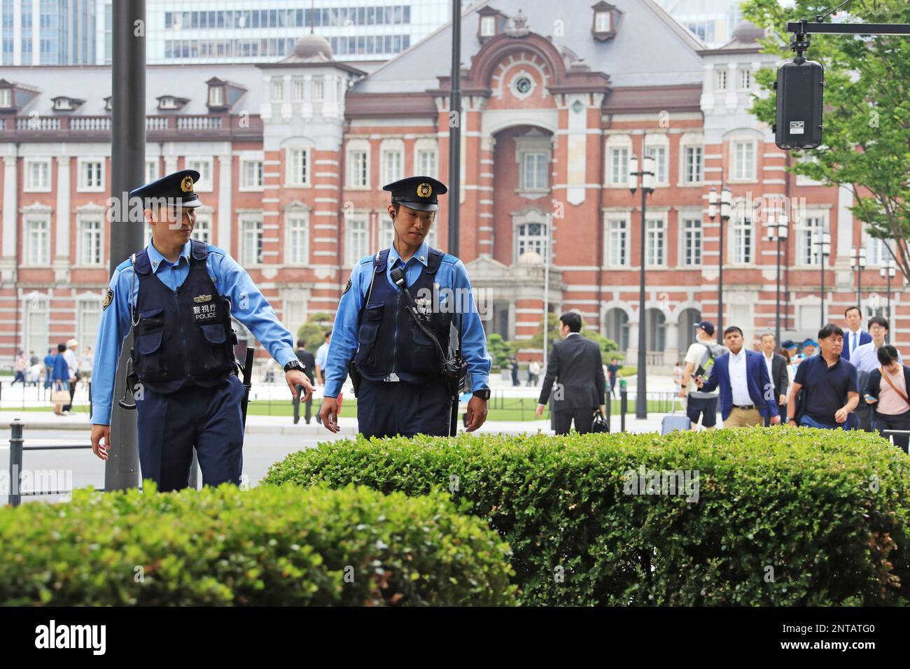 Riot police officers of the Tokyo Metropolitan Police Department patrol ...