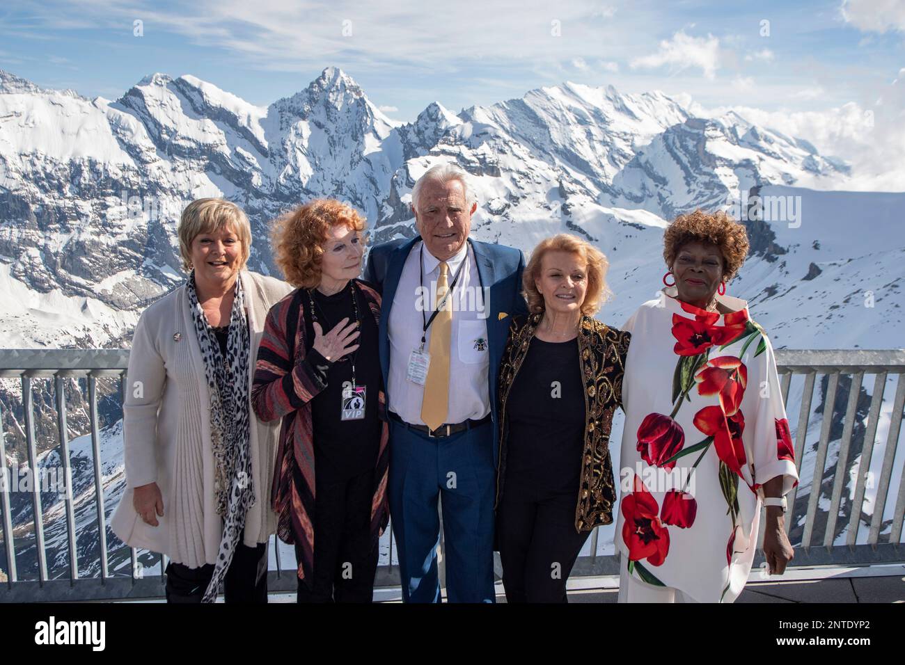The James Bond actors, George Lazenby, centre, poses with Bond Girls ...