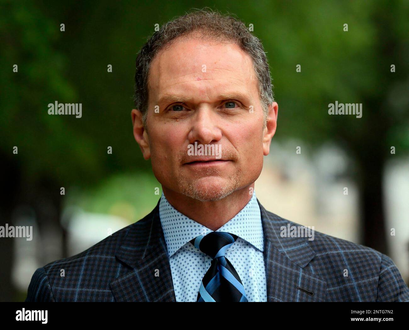 Businessman John Rallo leave federal court in St. Louis, Friday, May 10 ...