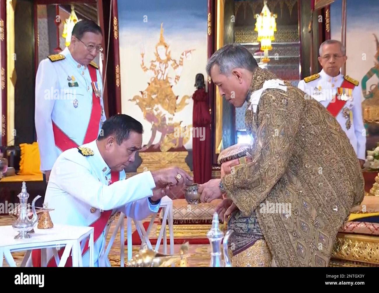 In this image made from the video, Thailand’s King Maha Vajiralongkorn, right, attends the ...