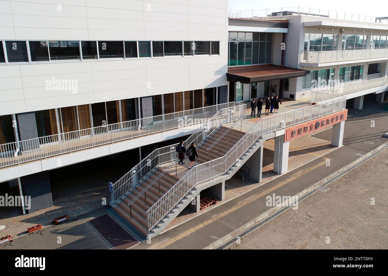 A rebuilt Arahama Junior High School is pictured at 1-kilometer form ...