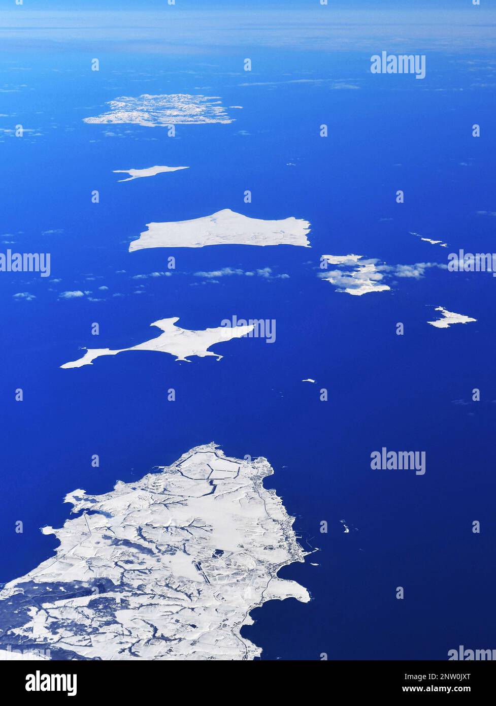 An aerial photo taken from Yomiuri Shimbun's jetliner shows the four ...