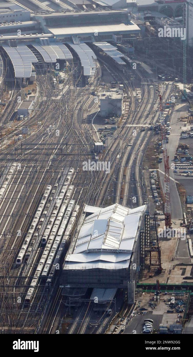 An aerial photo shows new station of Yamanote Line under construction ...