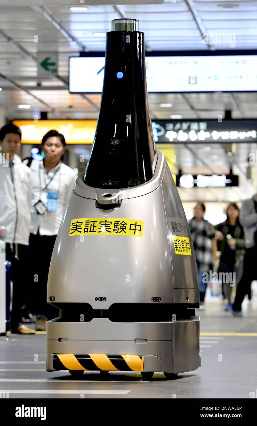 Perseusbot, a robot security guard, walks around the yard of Seibu ...