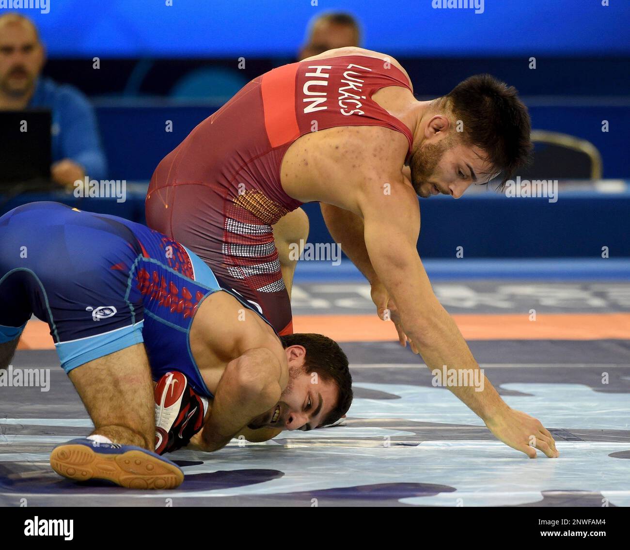Devid Safaryan, in blue, of Armenia wins agains Norbert Lukacs of ...
