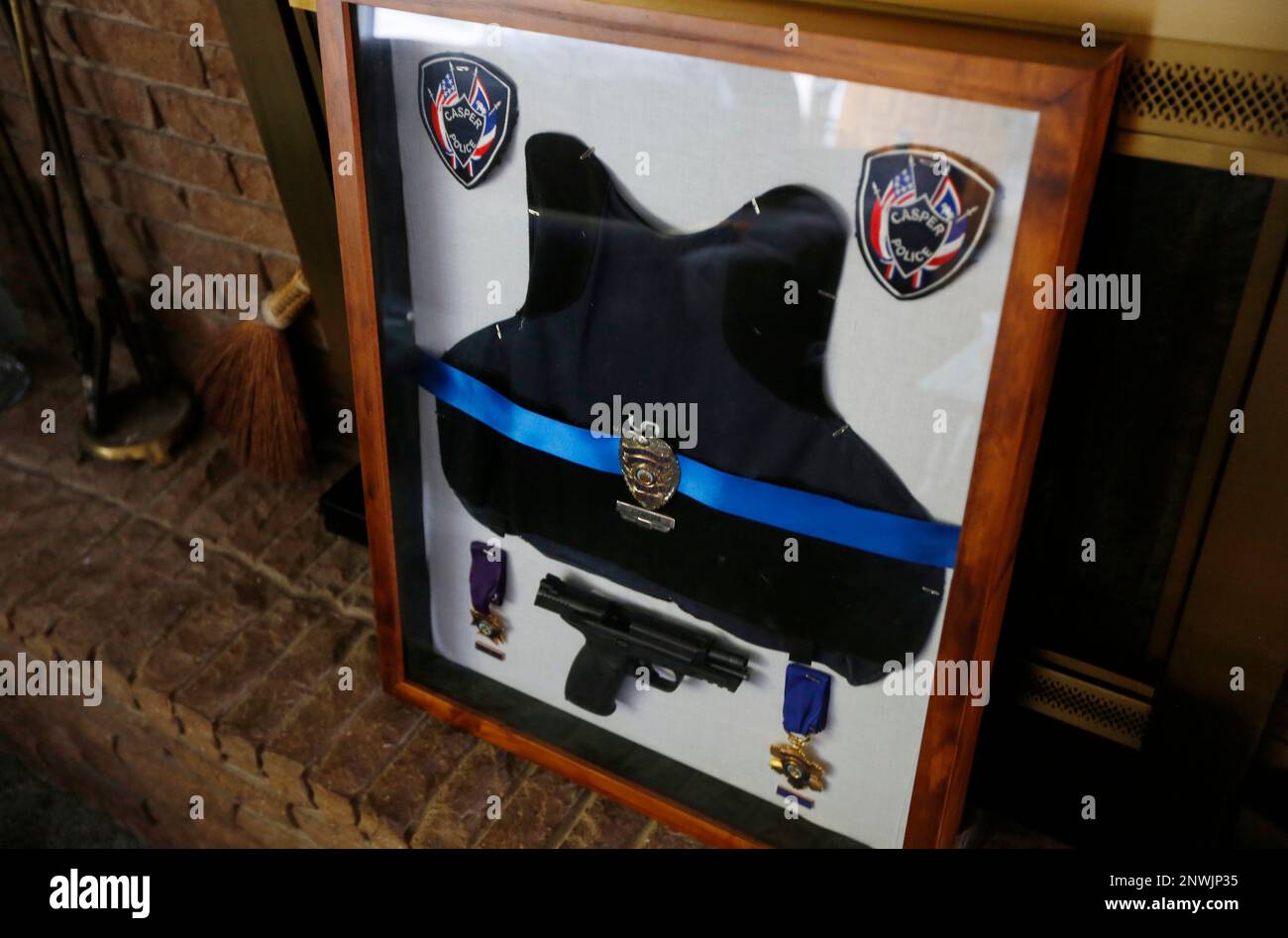 Tiffany Carlson made a shadow box for her husband Jacob Carlson, a ...