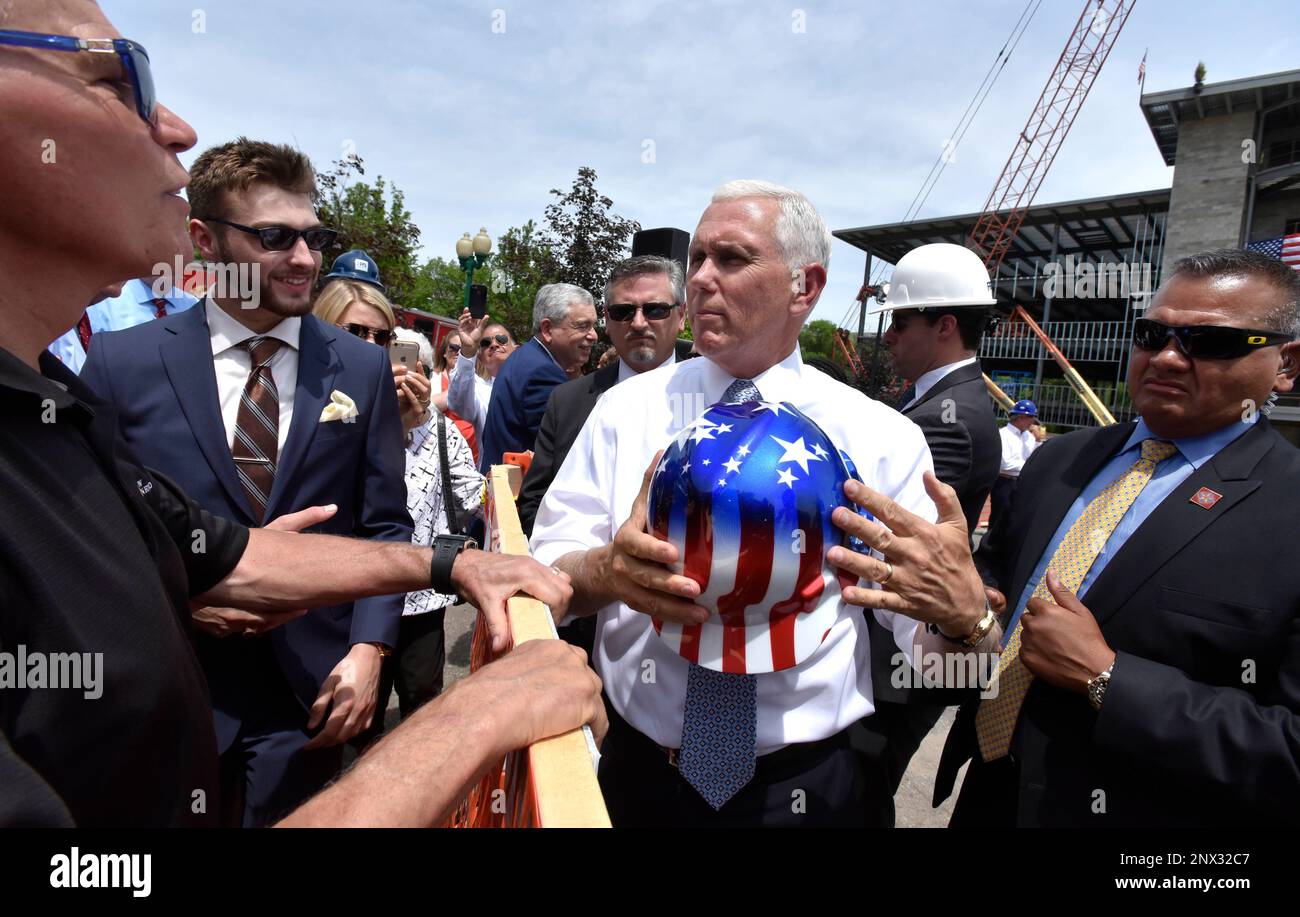 Vietnam War veteran Vito Pampalona, left, gives Vice President Mike ...
