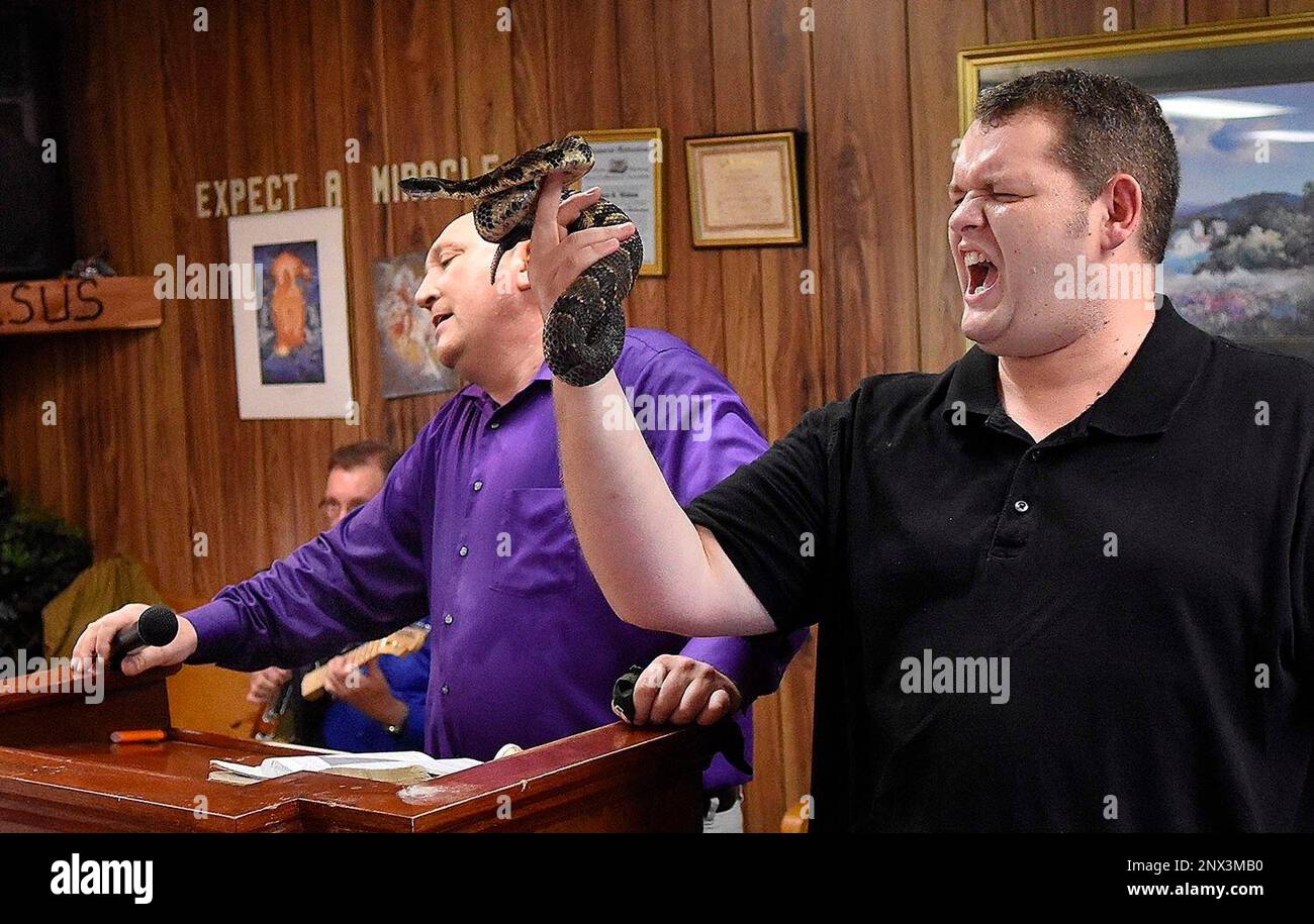 In this May 27, 2018 photo, Jason Stone, of Ruth, N.C. handles a ...