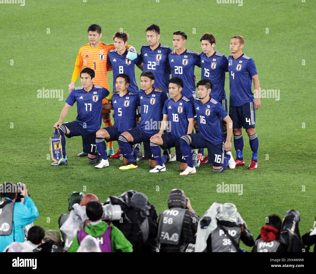Members of Japan's national team pose for photo befoer the friendly ...