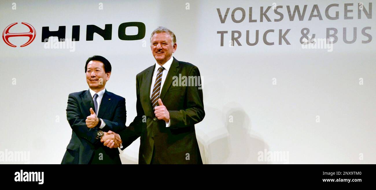 Germany's Volkswagen Truck & Bus GmbH CEO Andreas Renschler (R) and ...