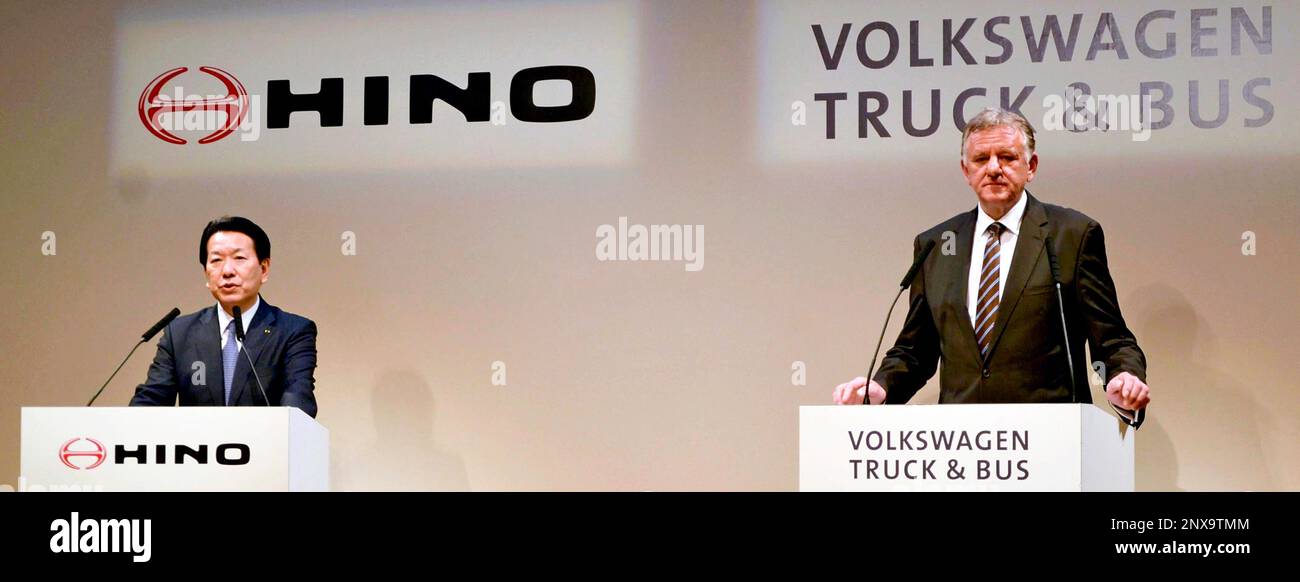 Germany's Volkswagen Truck & Bus GmbH CEO Andreas Renschler (R) and ...