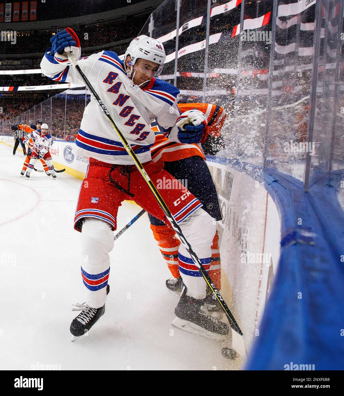 New York Rangers' Rob O'Gara (46) is checked by Edmonton Oilers' Ryan ...