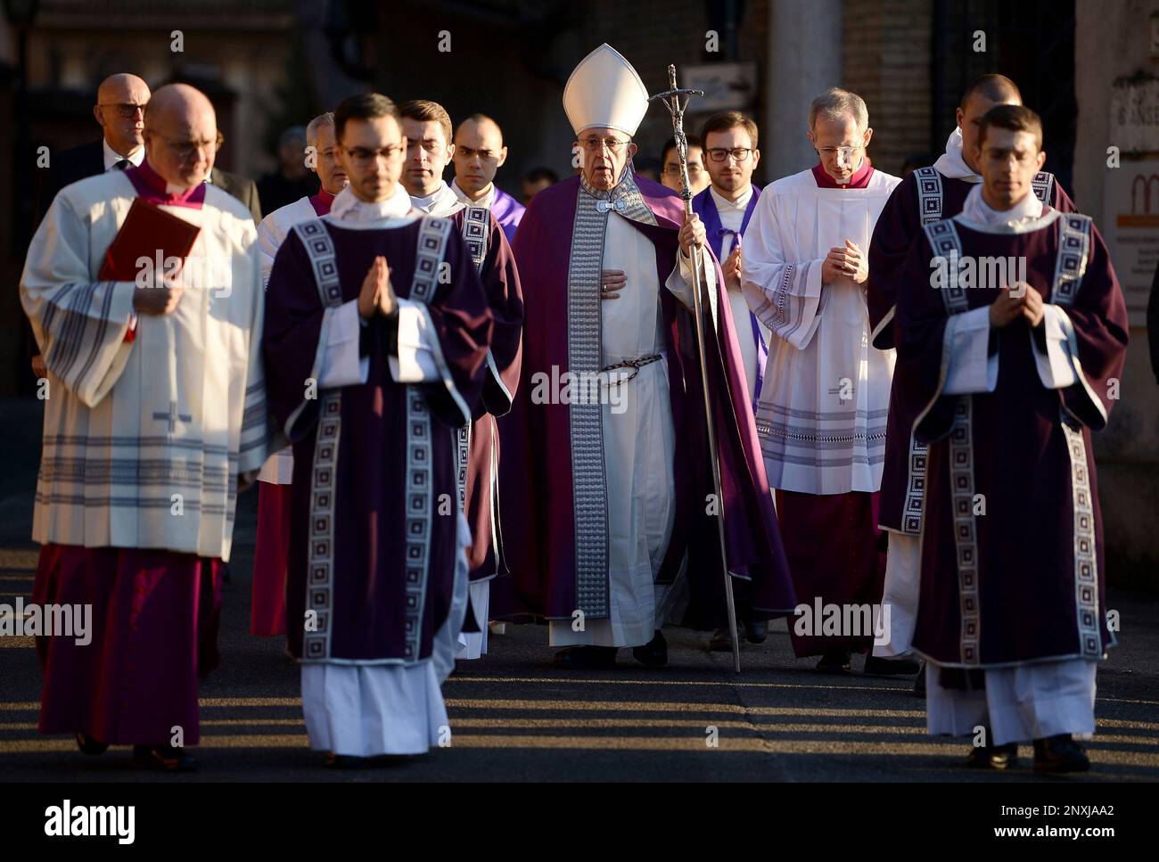 Pope Francis leaves the Basilica of Saint Anselmo walking in procession ...