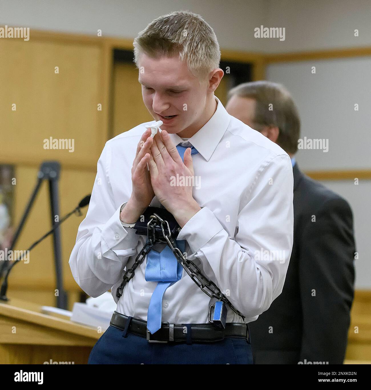 Jayzon Decker walks back to his seat after speaking during his ...