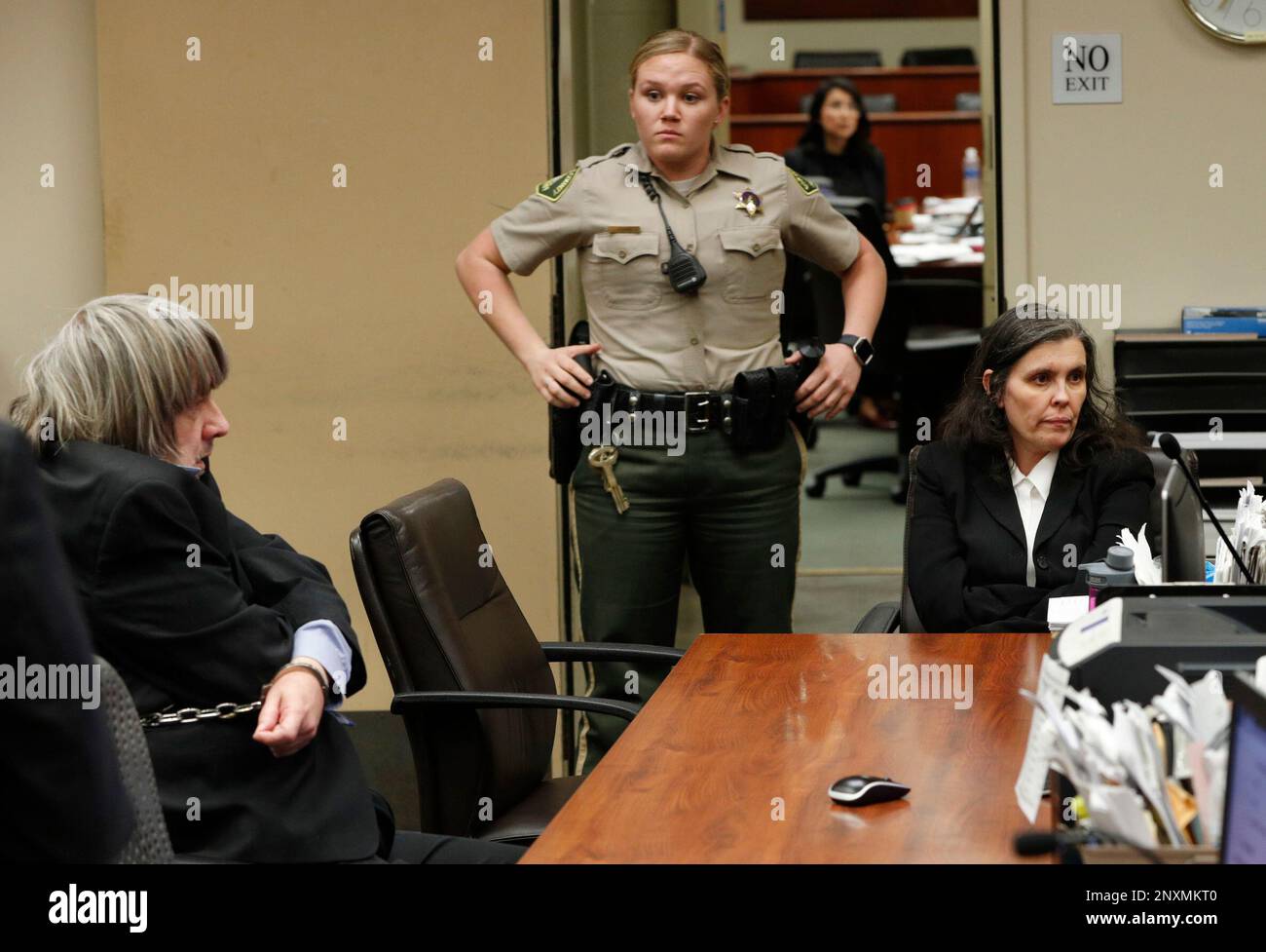 David Turpin, left, and his wife, Louise Turpin, right, appear in court ...