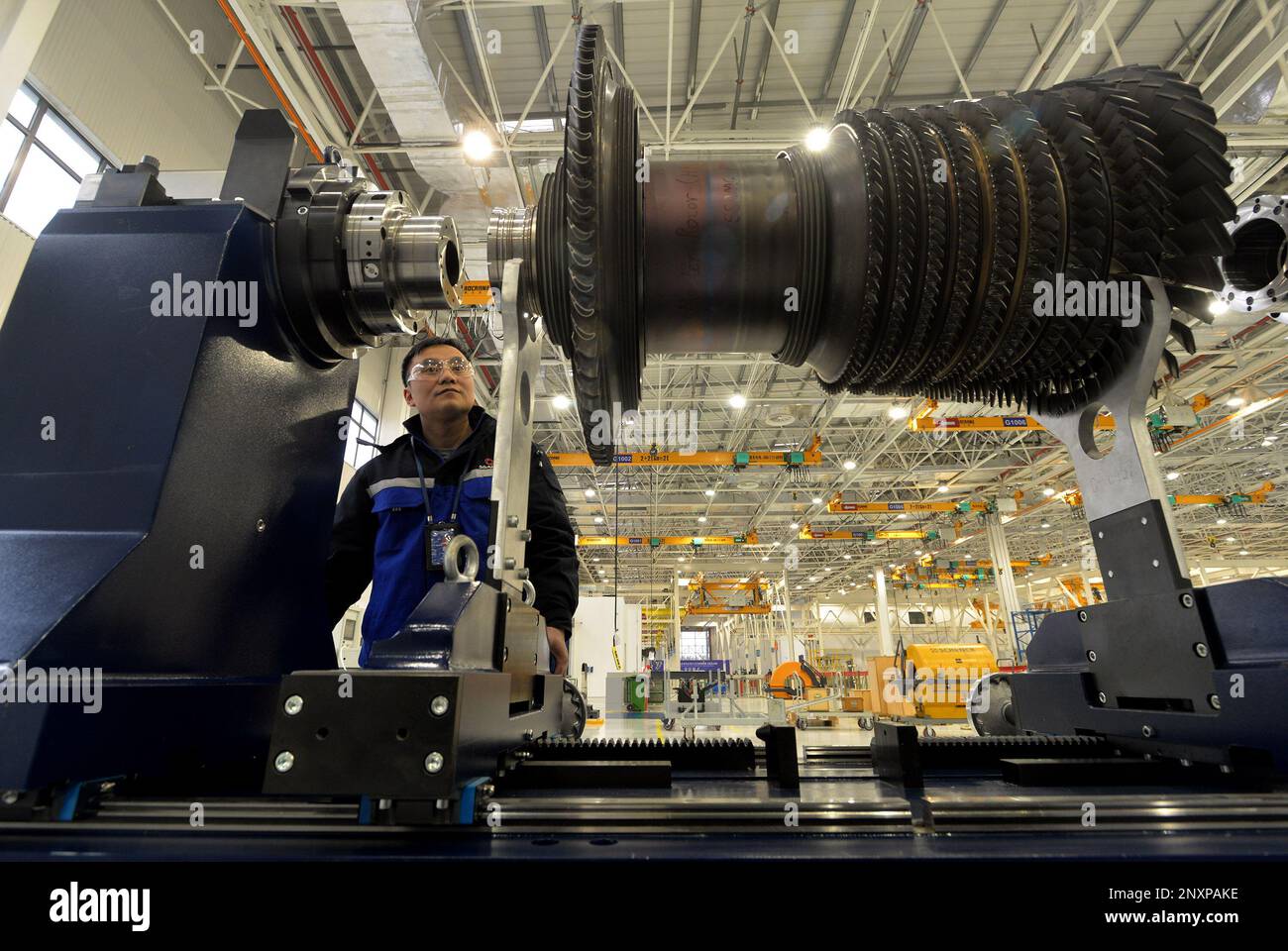 Workers repair an aero-engine at the new base of Sichuan International ...
