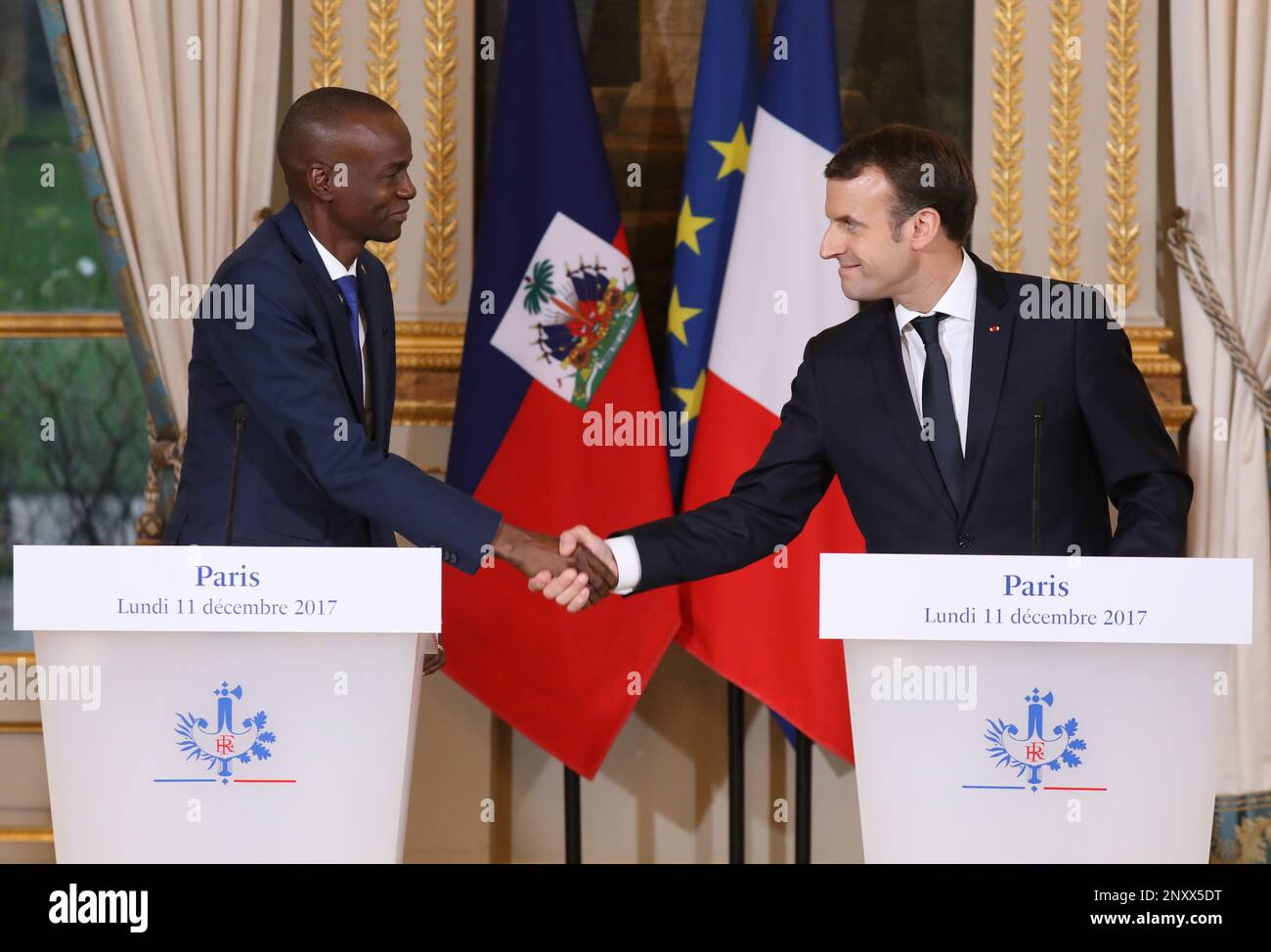 Haiti's President Jovenel Moise, left, and France's President Emmanuel ...