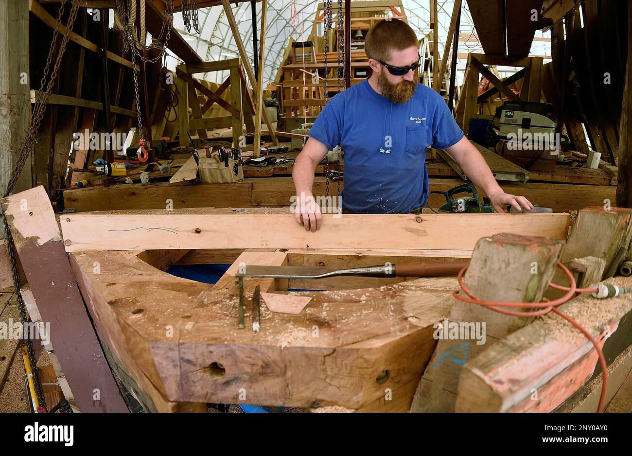 In this Oct. 12, 2017 photo, shipwright Chris Sanders checks the camber ...