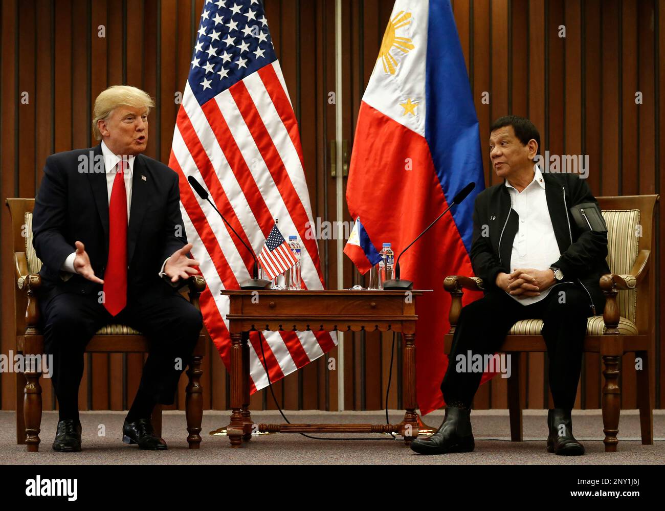 U.S. President Donald Trump, left, gestures beside Philippine President ...