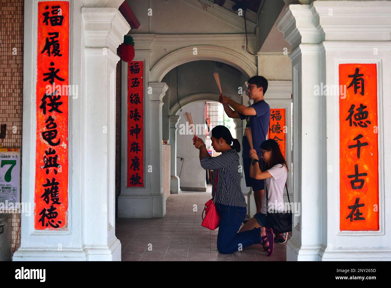 Devotees praying at Da Bo Gong temple at Kusu Island. The annual Kusu ...