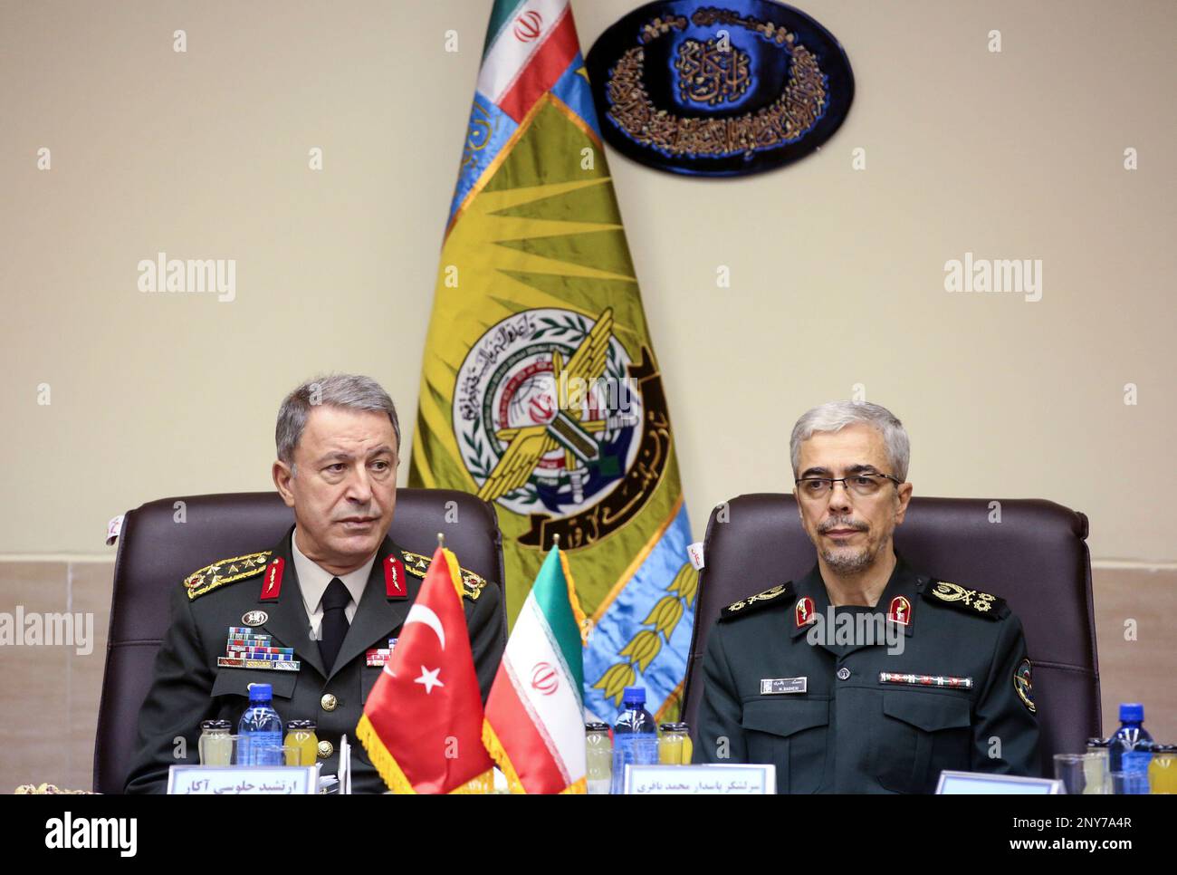 Turkey's Chief of Staff Gen. Hulusi Akar, left, and Iran's Chief of Staff of Armed Forces, Gen ...