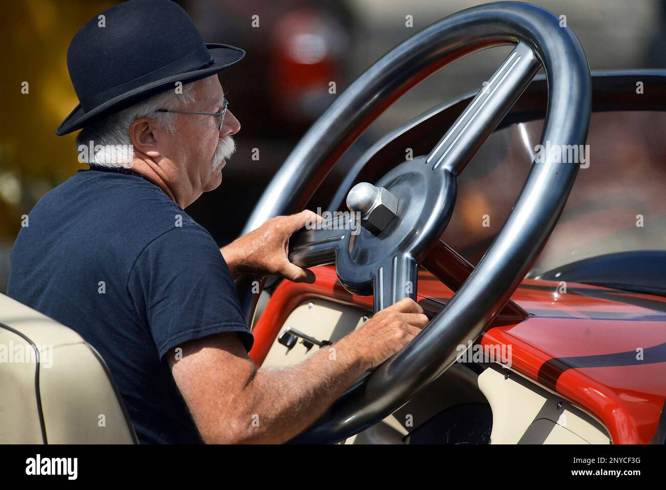 Dan Hryhorcoff, of Justus, Pa., takes the 32-inch wheel while cruising ...