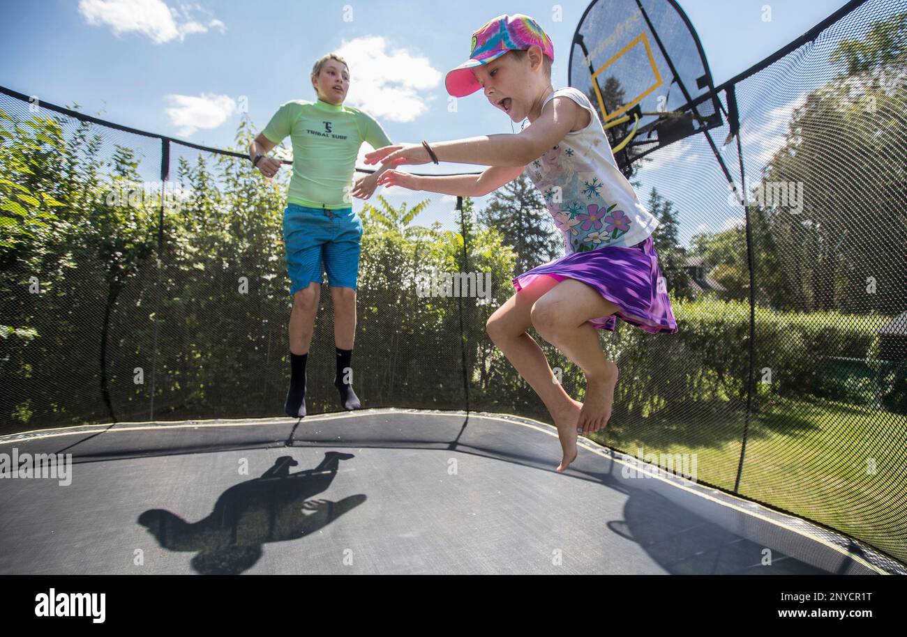 Sam McGonigle, left, 12, and his sister, Aislin McGonigle, 6, both are ...