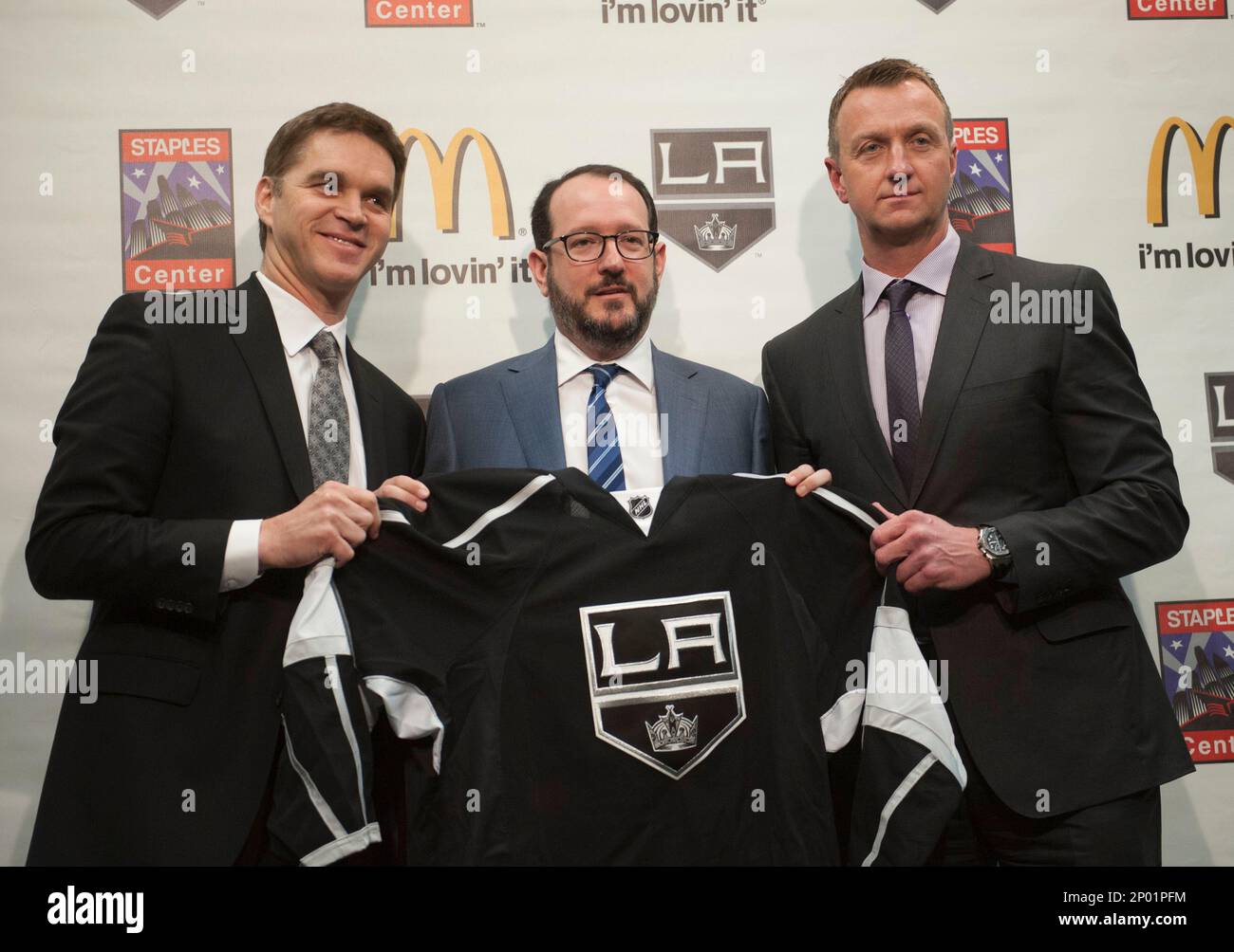 Dan Beckerman, center, president and CEO of AEG, the parent company ...