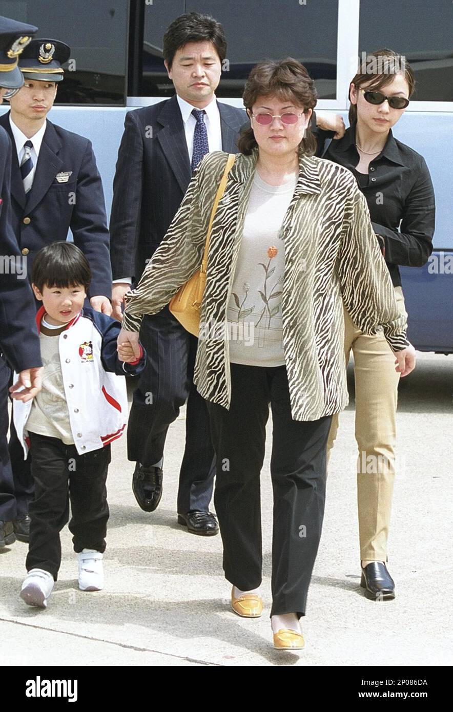 File: A photo shows a boy (L) who believed to be Kim Han Sol, the son ...