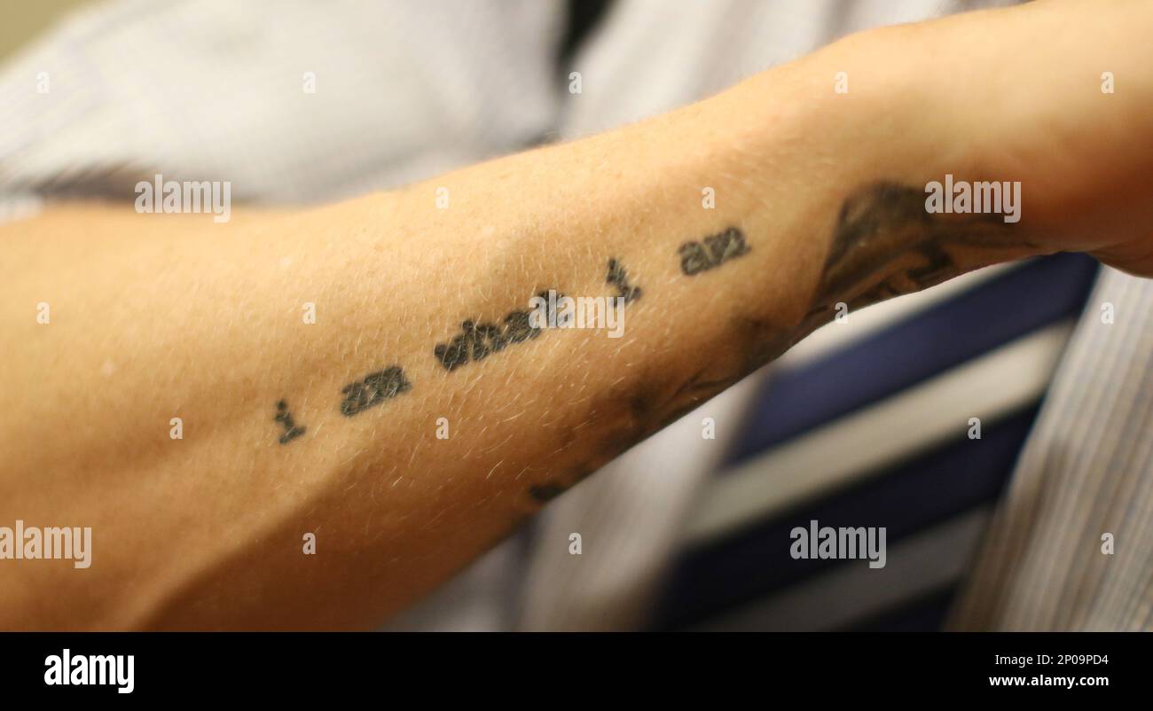Lawyer David Lee Windecher shows some of his tattoos in Judge Asha ...