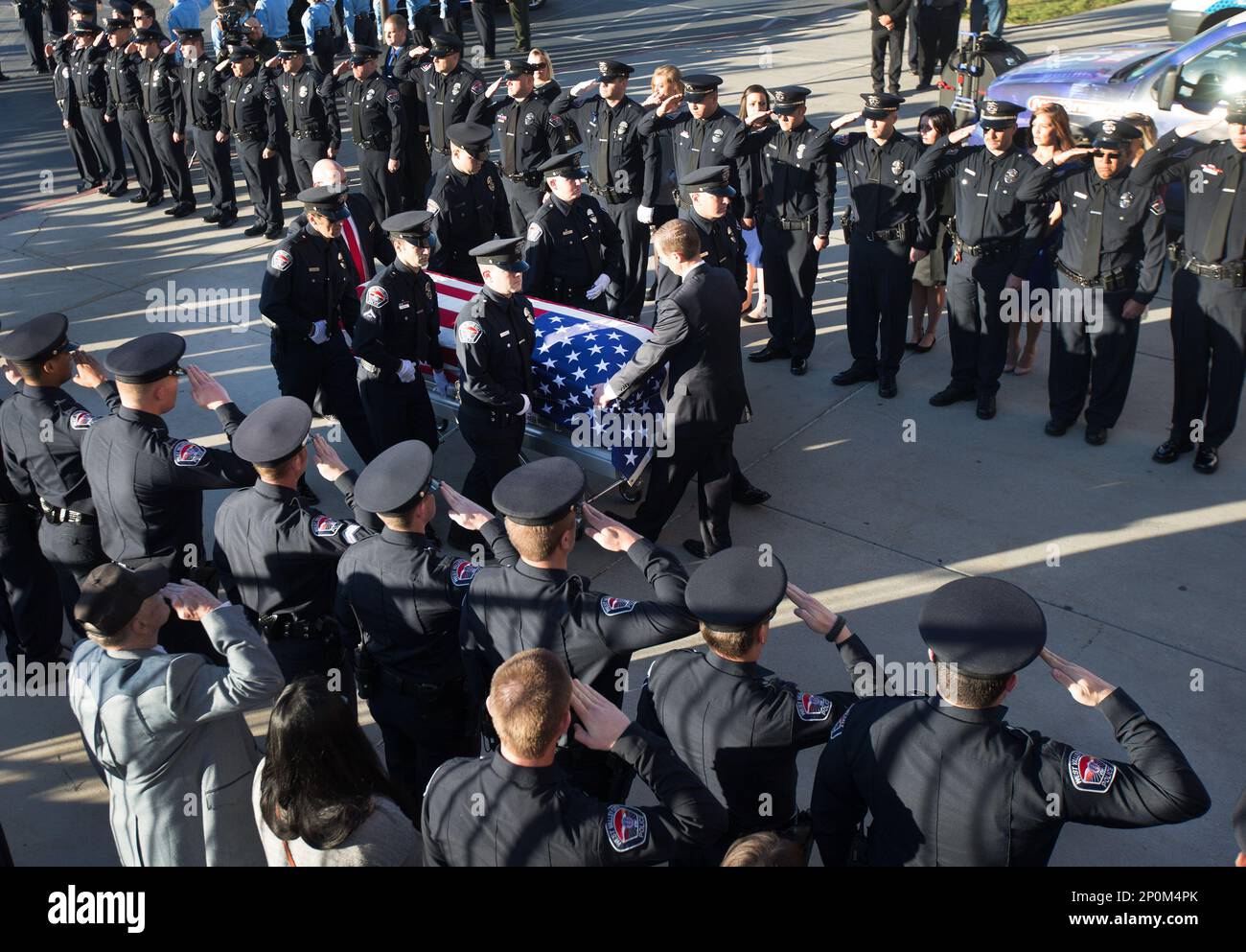 The casket of West Valley City Police officer Cody Brotherson arrives ...