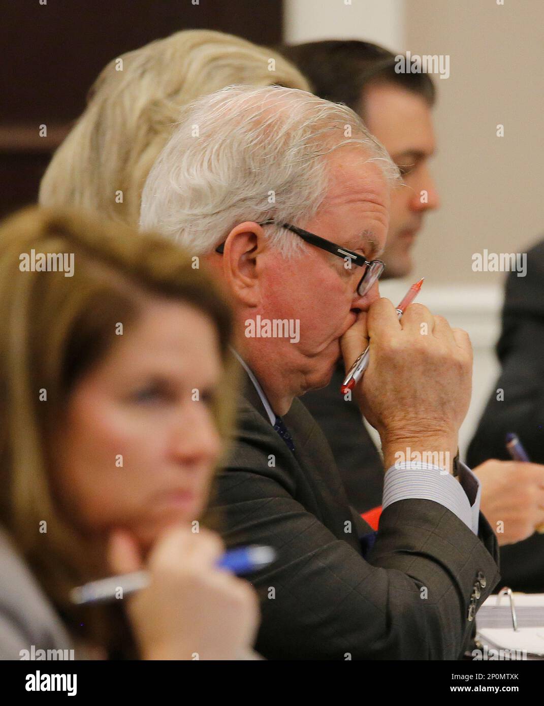 Defense attorney, second from left, sits at the defense table during ...