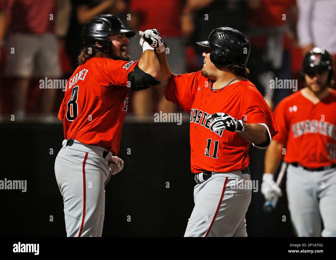 Texas Tech's Stephen Smith, right, celebrates with Tanner Gardner, left ...
