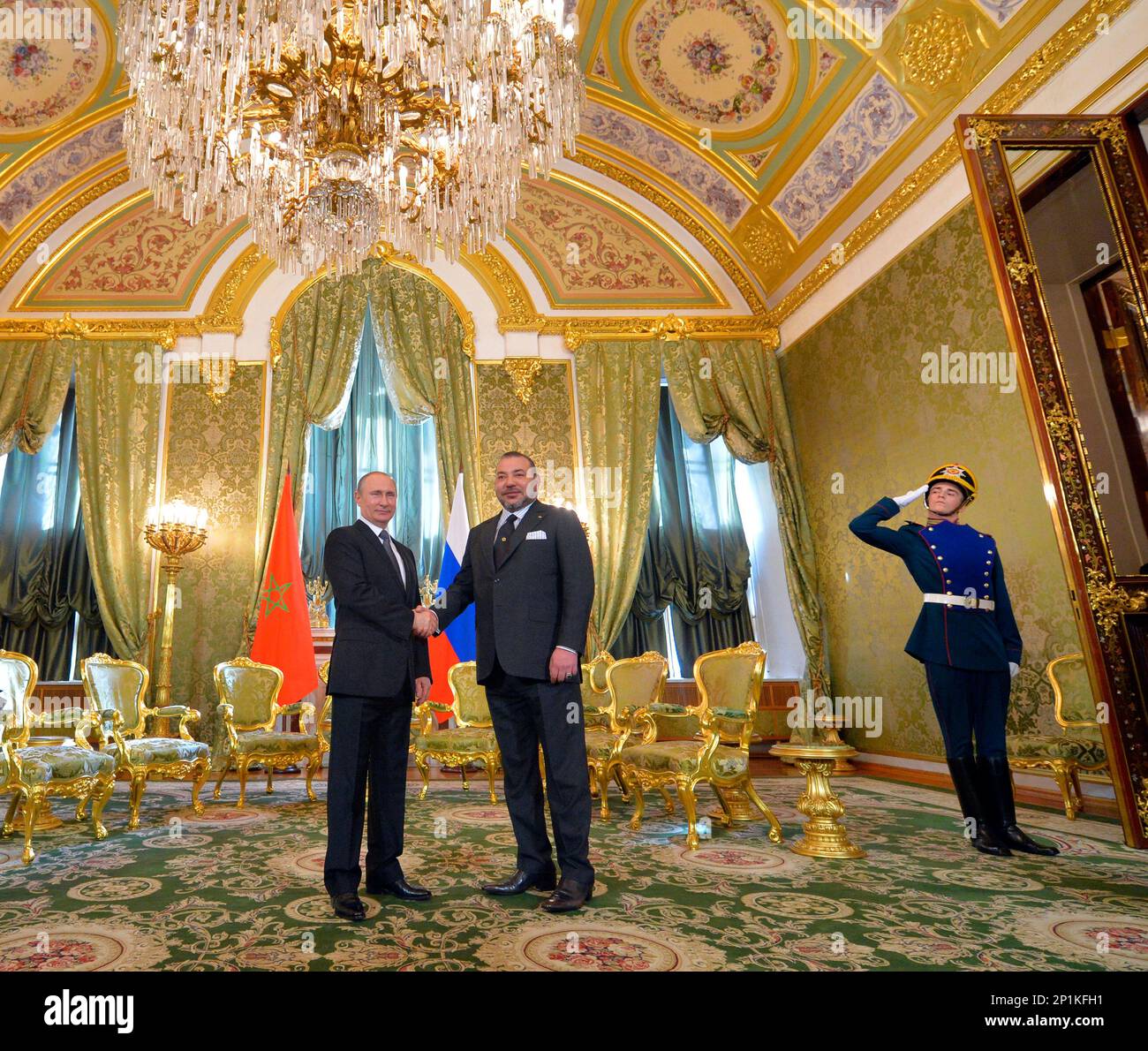 Russian President Vladimir Putin, left, shakes hands with Morocco's ...