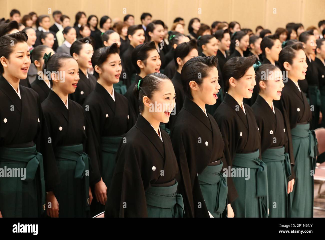 Graduates of Takarazuka Music Shool, clad in traditional black crested ...