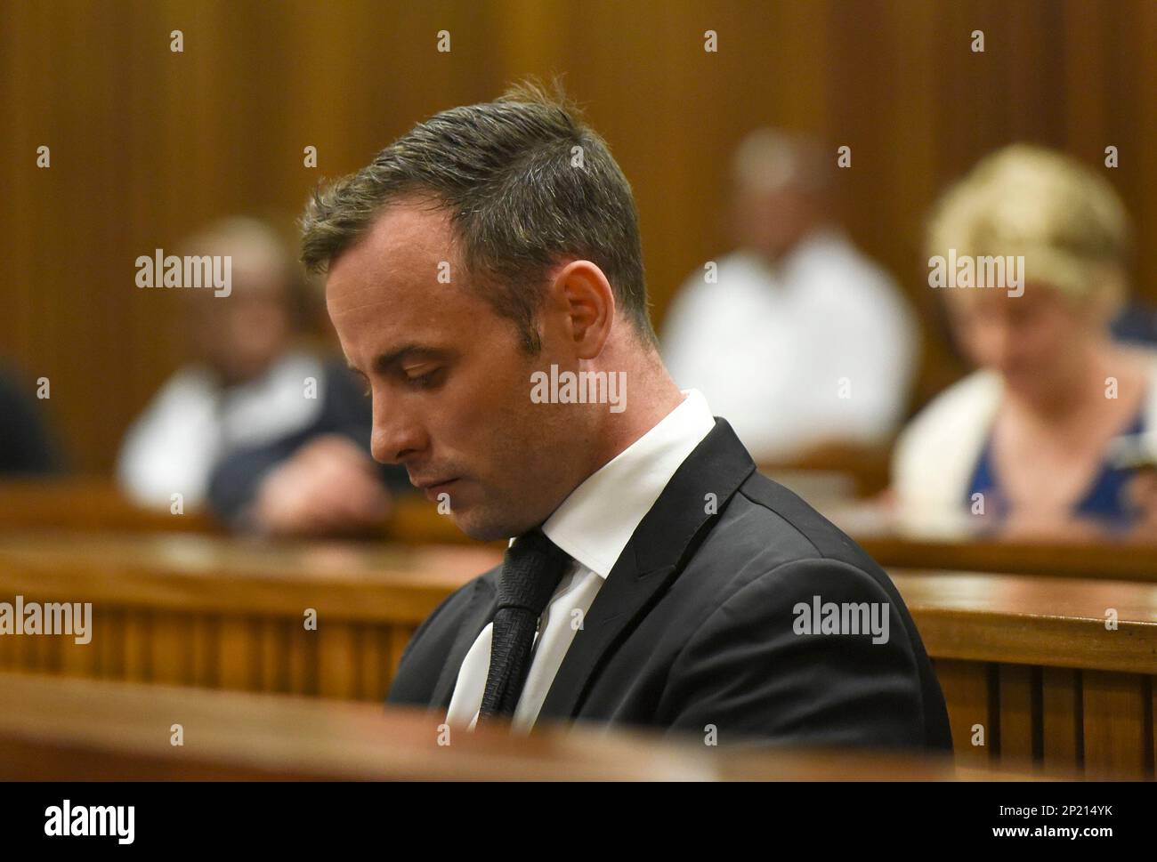 Oscar Pistorius sits in the dock at a courtroom of the North Gauteng ...