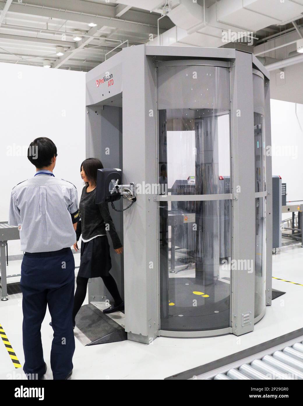 A “full-body scanner” is shown to media on at Terminal 2 of Kansai ...