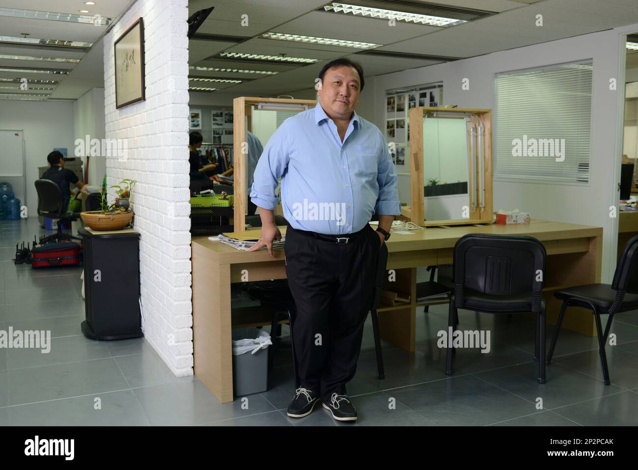 Hong Kong film director Jing Wong poses for photos in his studio in ...