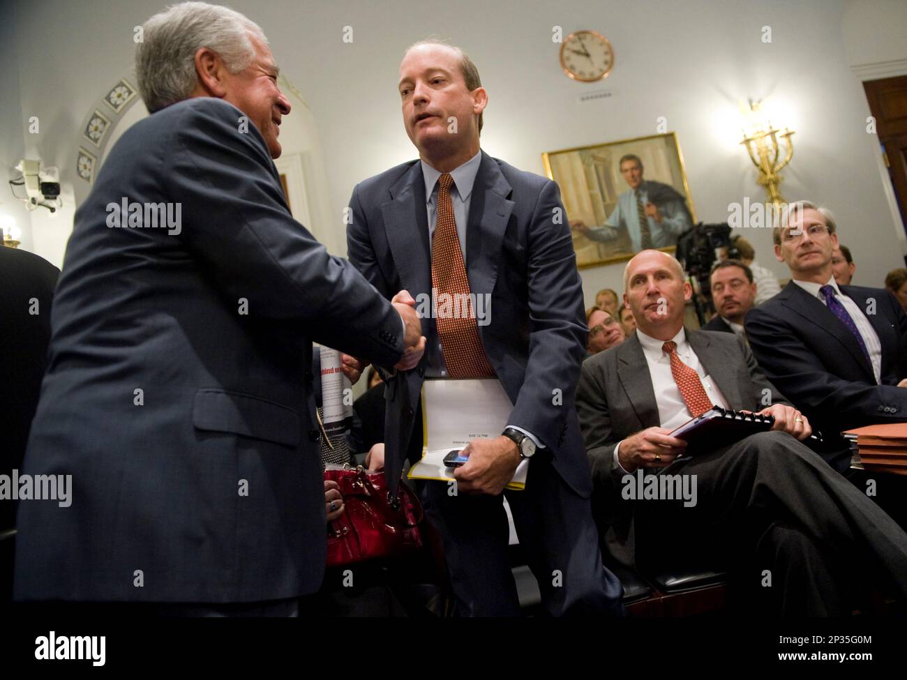 Chairman Nick Rahall, D-W.V., left, greets Lamar McKay, chairman and ...