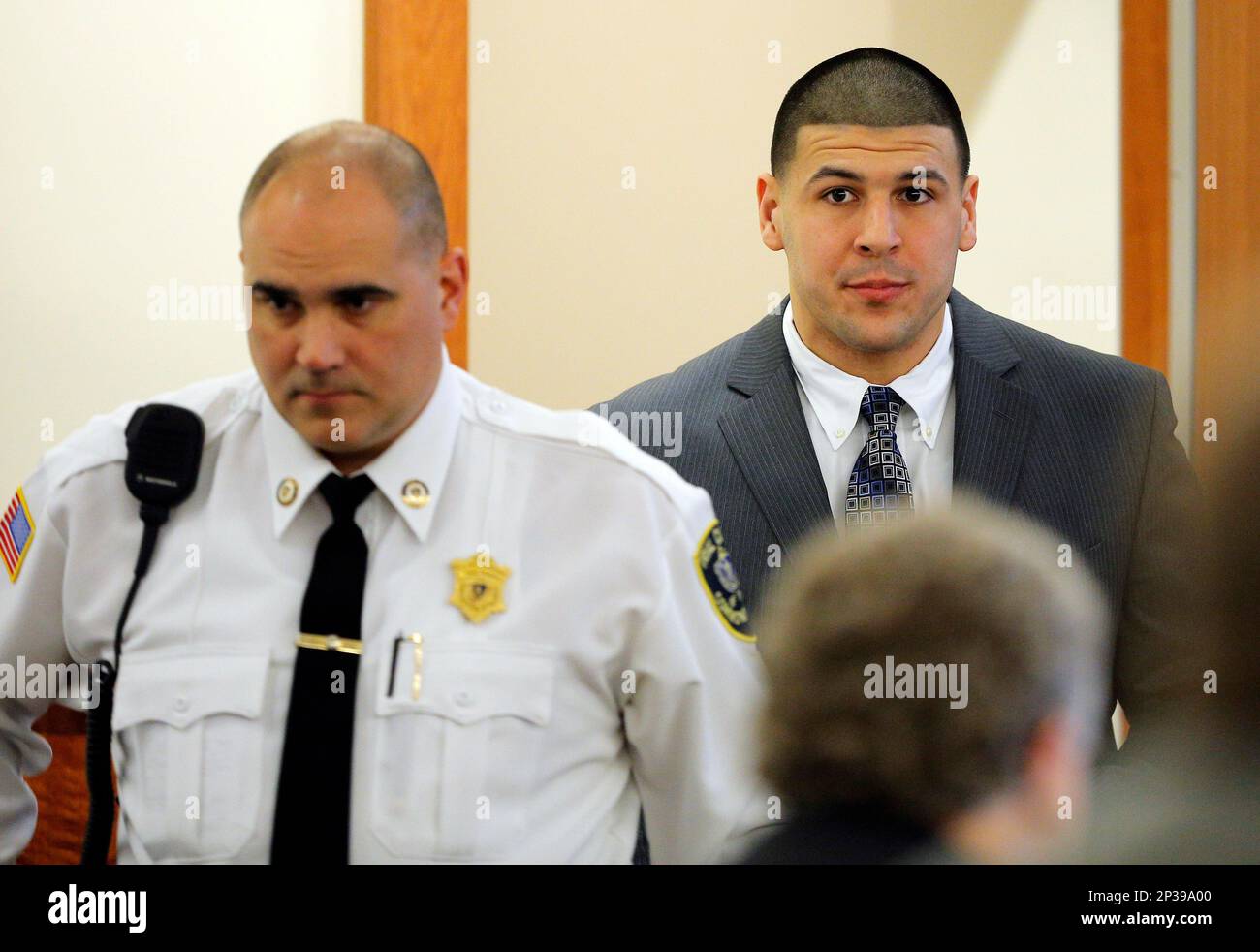 Former New England Patriots NFL football player Aaron Hernandez is led ...